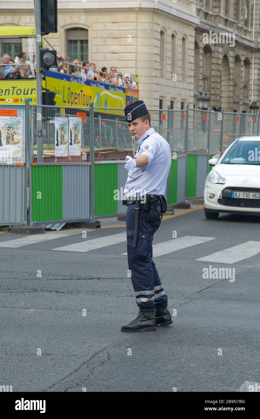 Traffic cop in Paris France Stock Photo - Alamy