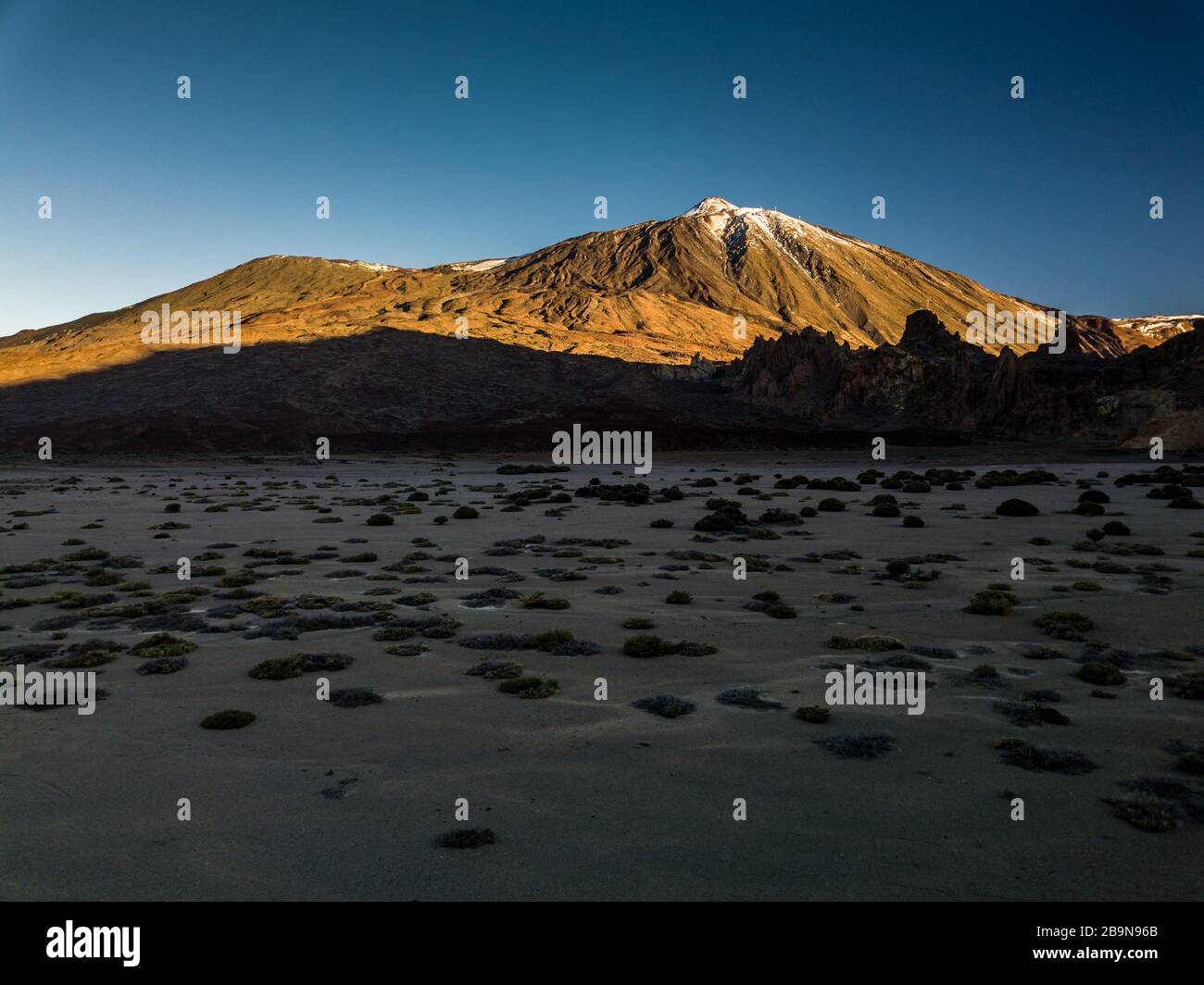Peaks of Teide and Pico Viejo volcanoes at sunset seen from the Samara ...