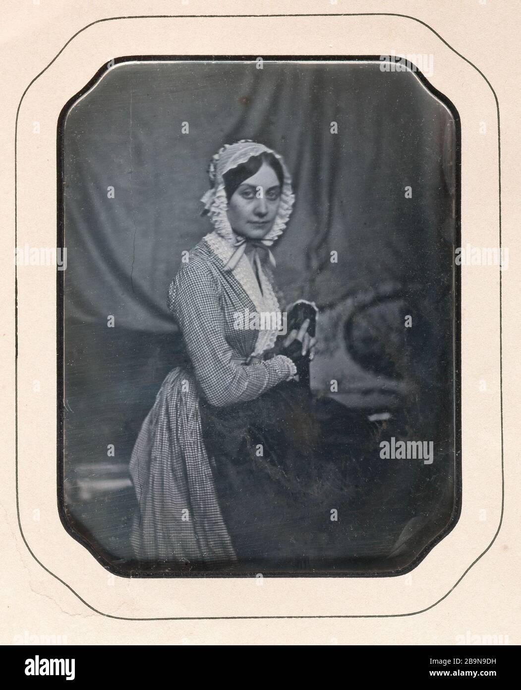 Mrs. Reisener with white cap and plaid dress Madame Riesener avec ...