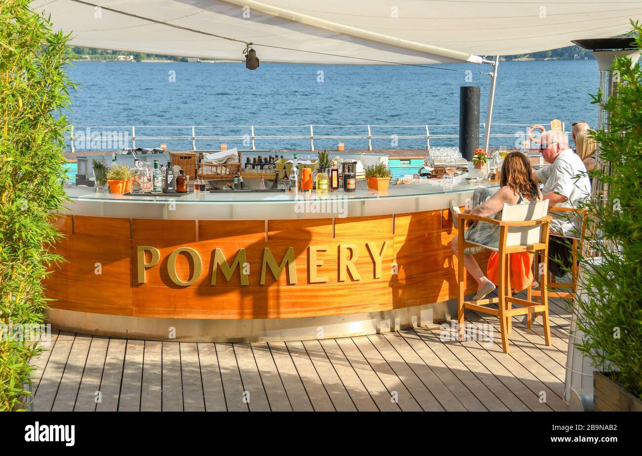 TREMEZZO, LAKE COMO - JUNE 2019: The outdoor lakeside bar of the Grand ...