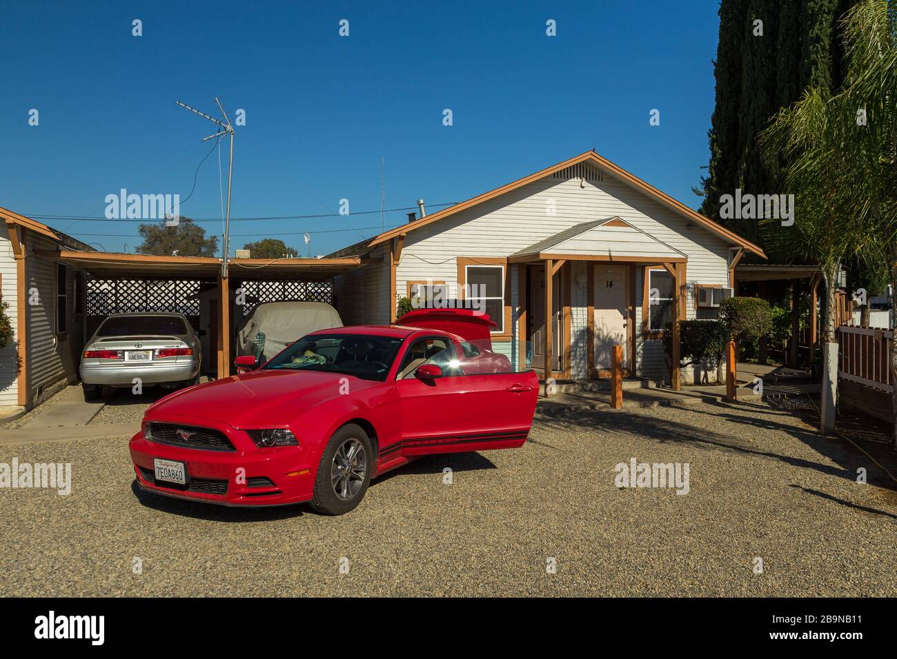 Madera, California, USA - 07 June 2015: Red Ford Mustang in front of ...