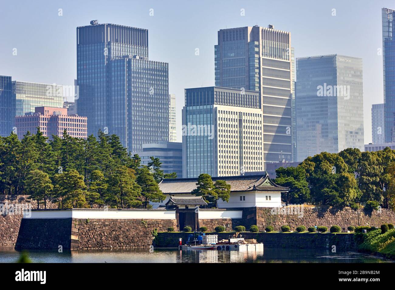 Ancient wall and modern buildings in Tokyo Stock Photo - Alamy