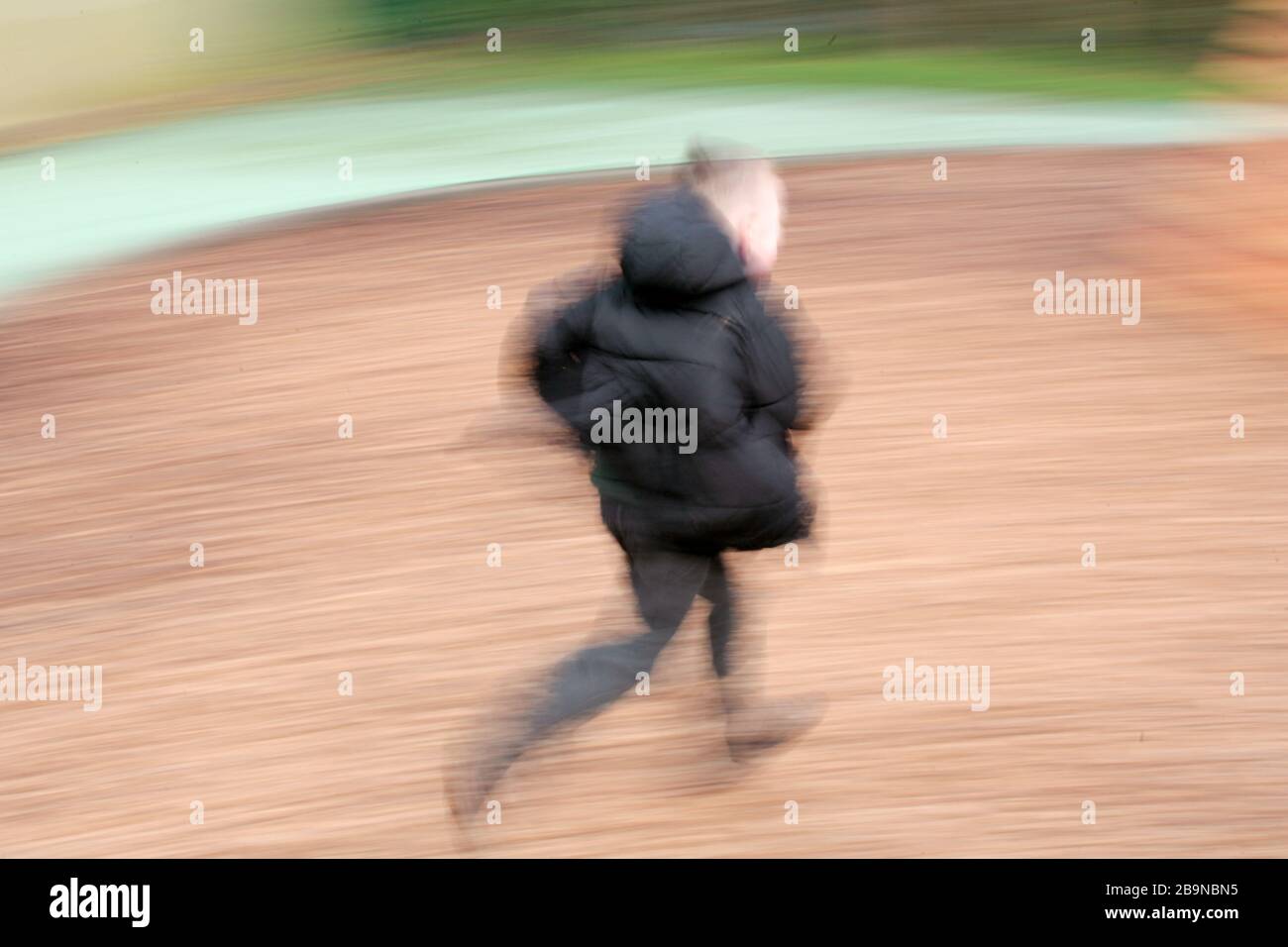 schoolboy running around the playground Stock Photo - Alamy
