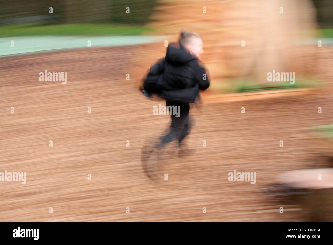 schoolboy running around the playground Stock Photo - Alamy