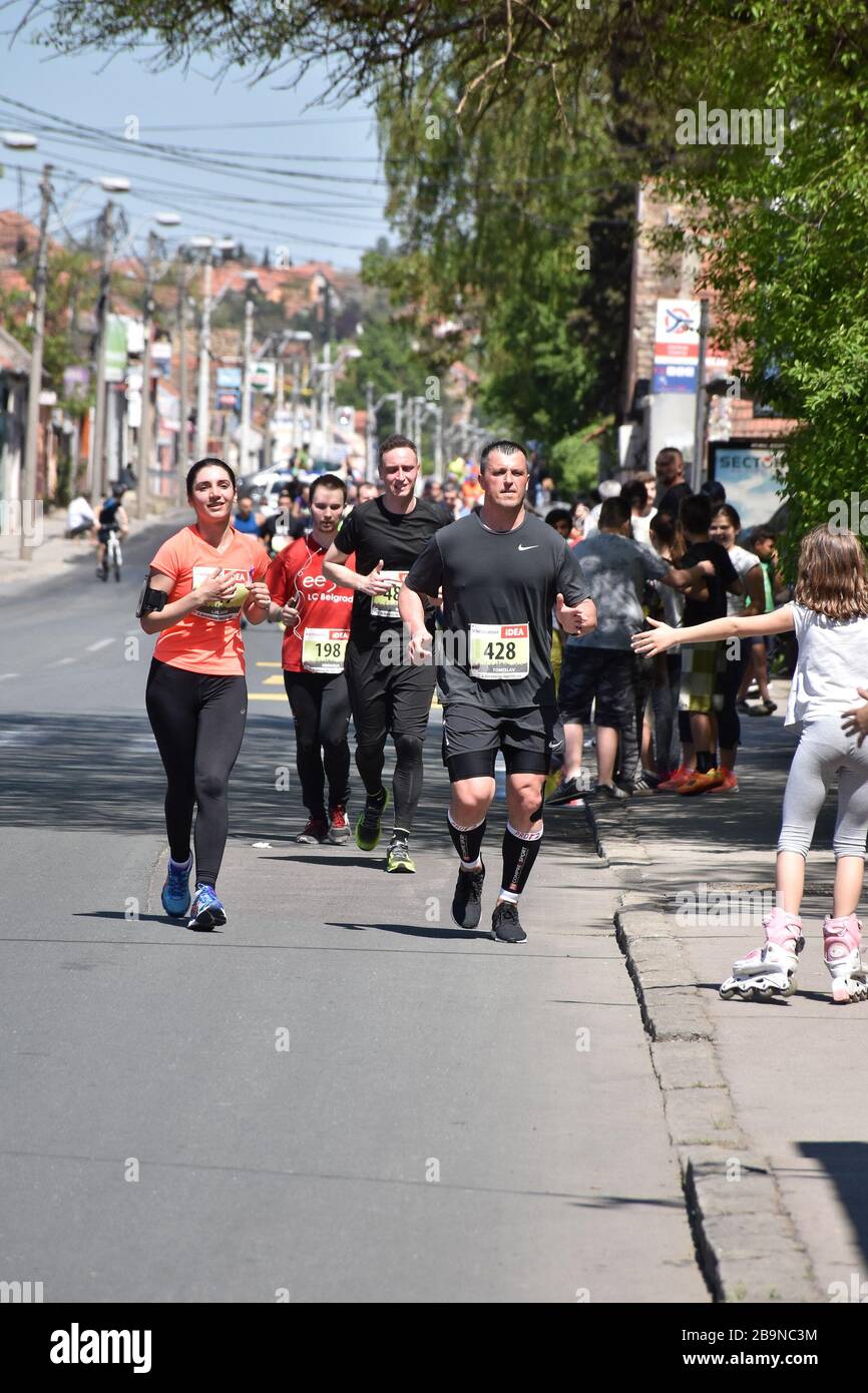 Athletes street race hi-res stock photography and images - Alamy