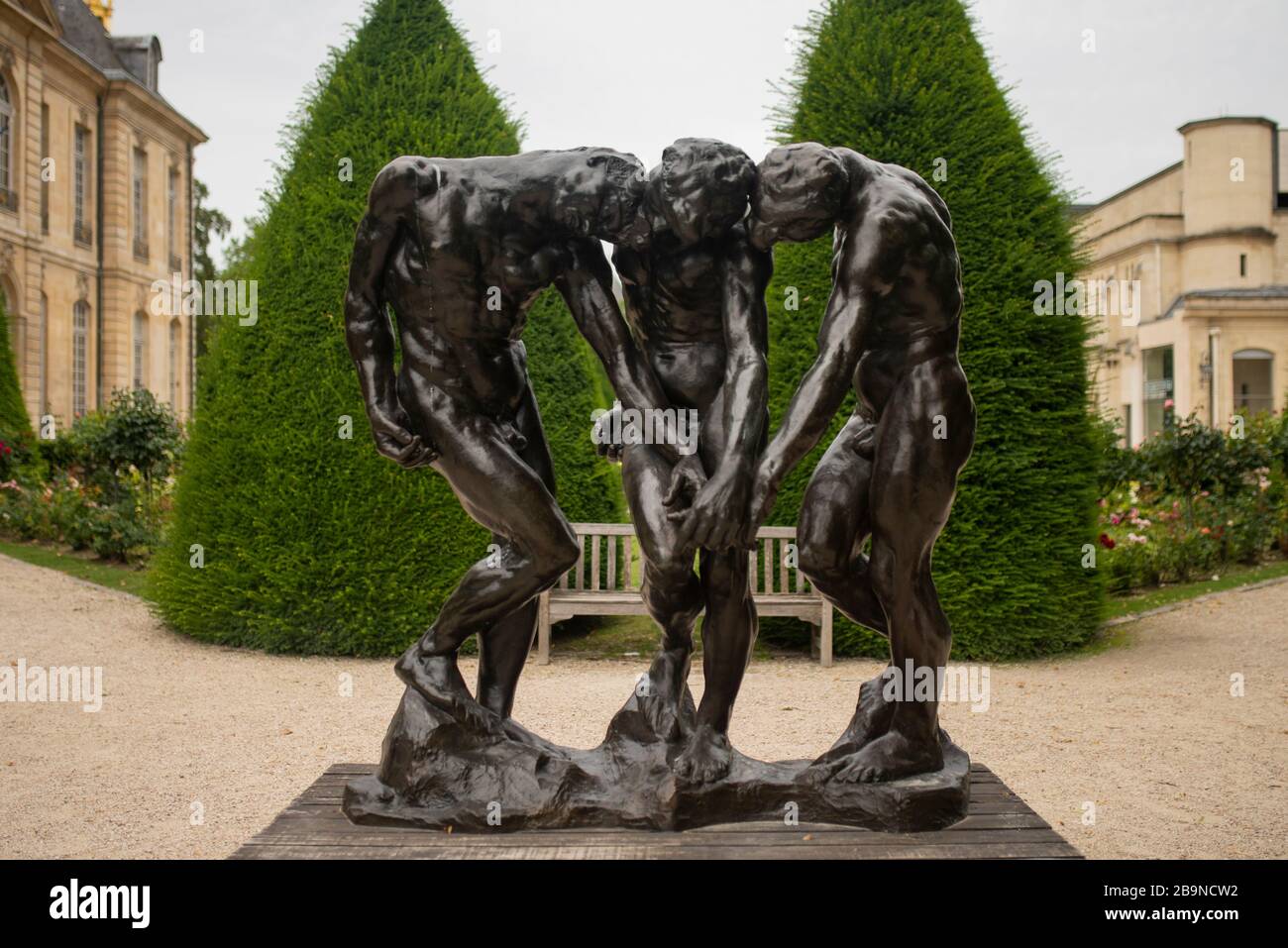 Peaceful park of Museum Rodin. Sculpture of the Three Shades, inspired ...