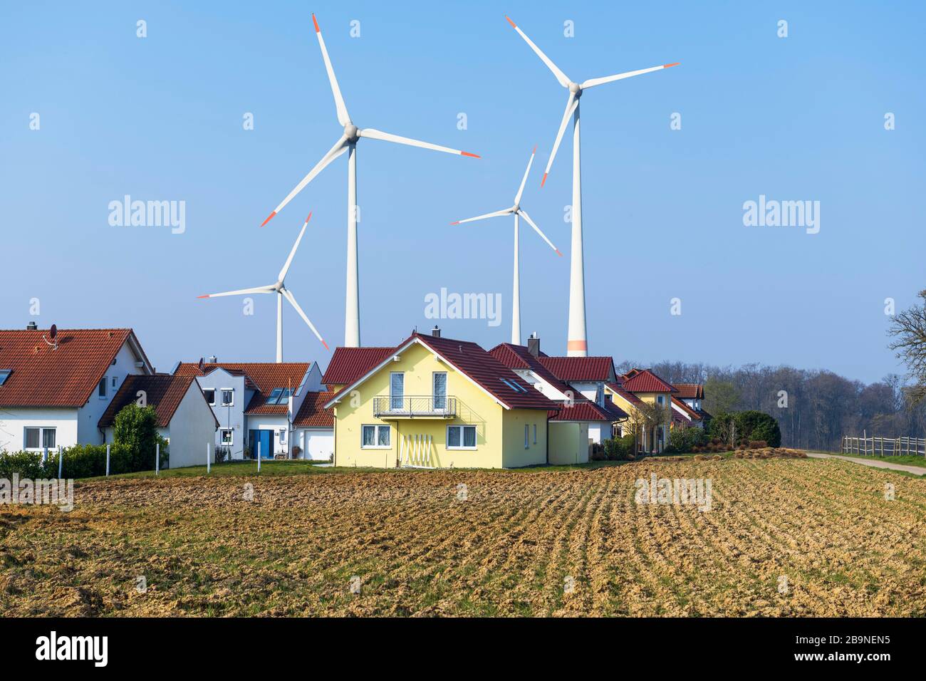 New housing estate with wind turbines hi-res stock photography and ...