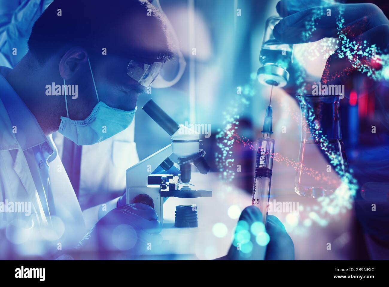 Doctor in the laboratory analyzes samples under a microscope ...