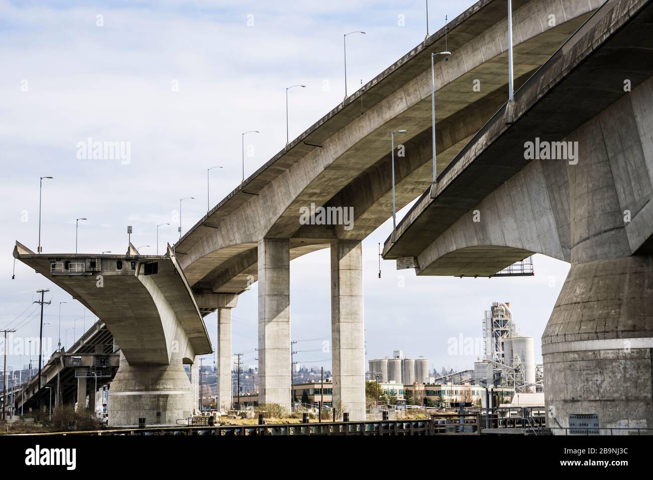 Spokan Street Bridge in Seattle, Washington opening for a barge to go ...
