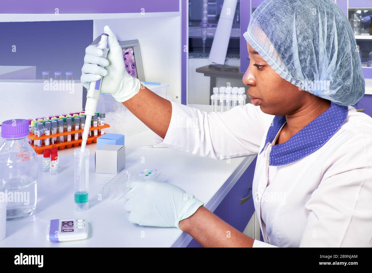 Female African medical students, young graduates in research laboratory ...