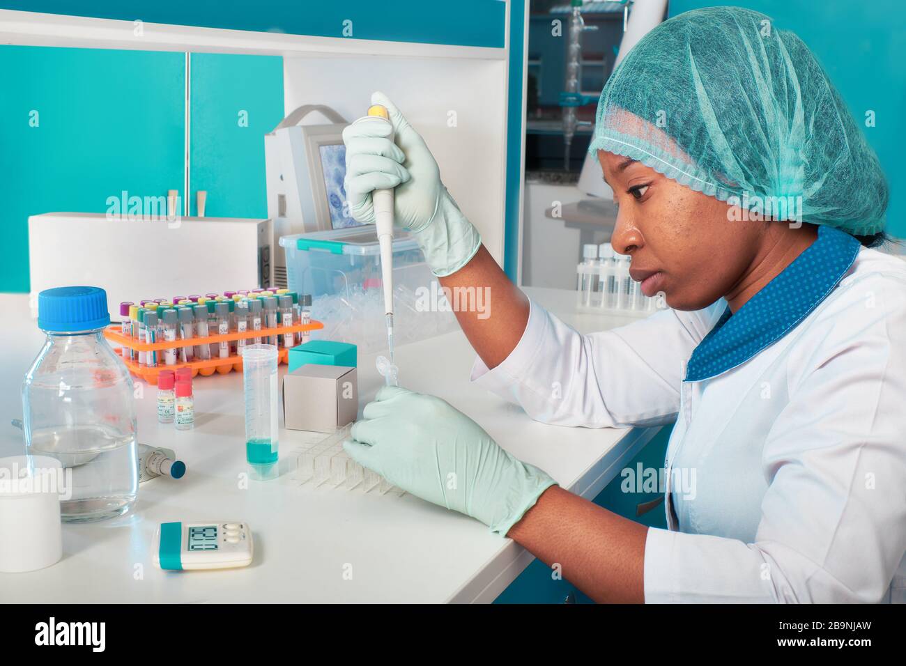 Female African medical students, young graduates in research laboratory ...