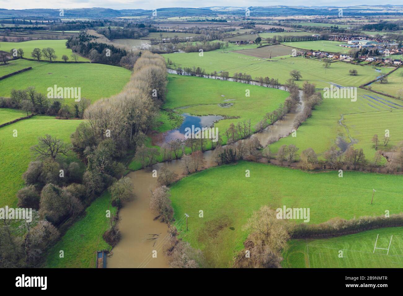 River Teme across fresh green fields of Shropshire at spring Stock ...