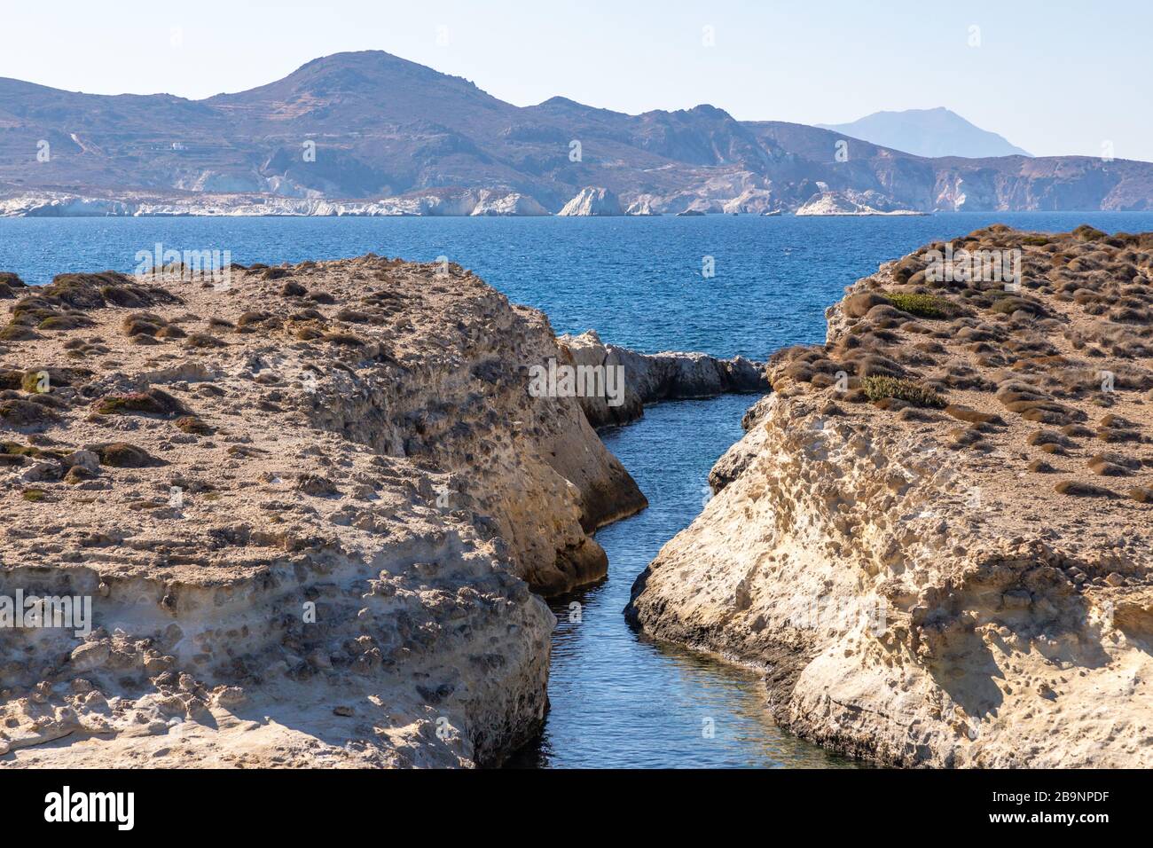 Mountains and cliffs in Paralia Alogomandra beach, Milos, Greece Stock ...