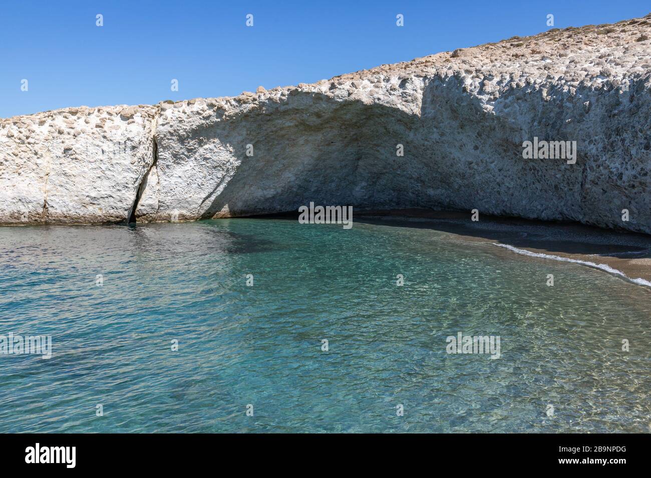 Cave and cliff in Alogomandra beach, Milos, Greece Stock Photo - Alamy