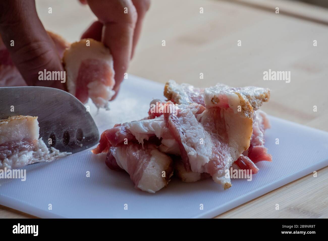 Garlic and bacon.Bacon and garlic. Bacon and garlic on a table on a ...