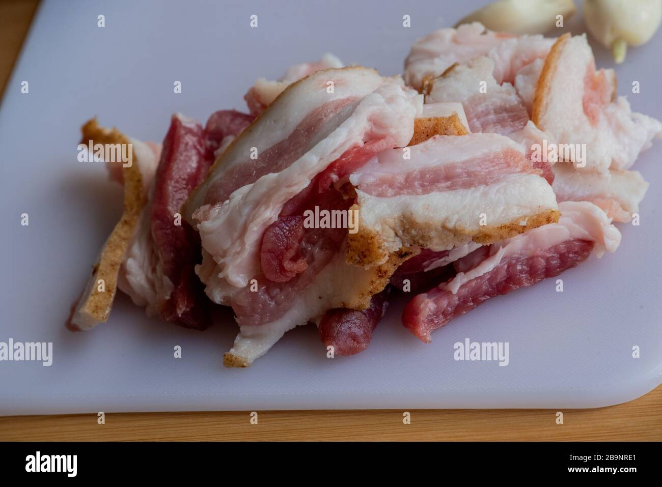 Garlic and bacon.Bacon and garlic. Bacon and garlic on a table on a ...