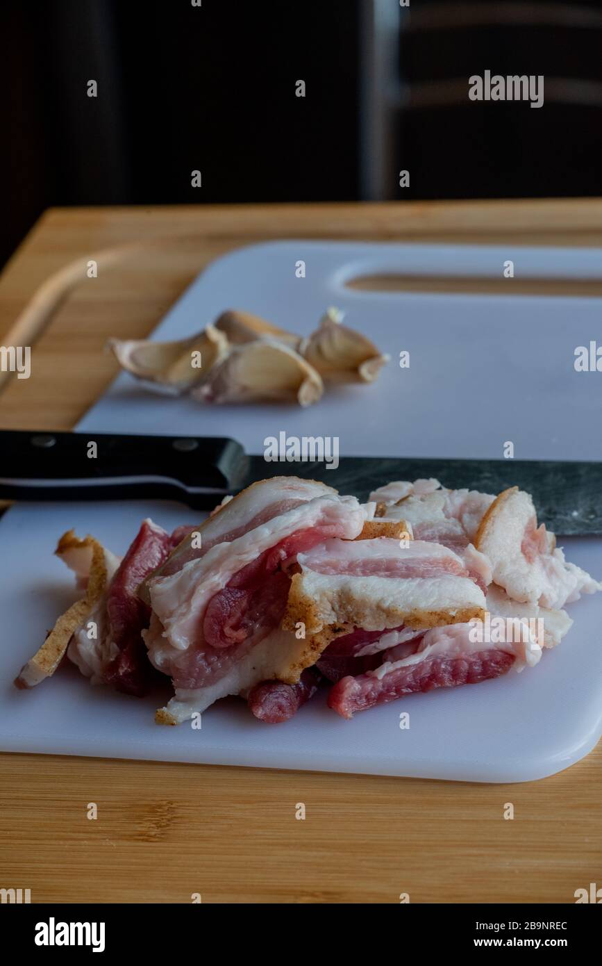 Garlic and bacon.Bacon and garlic. Bacon and garlic on a table on a ...