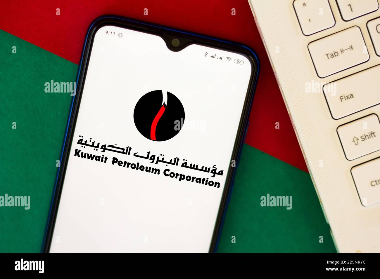 In this photo illustration a Kuwait Petroleum Corporation logo seen ...