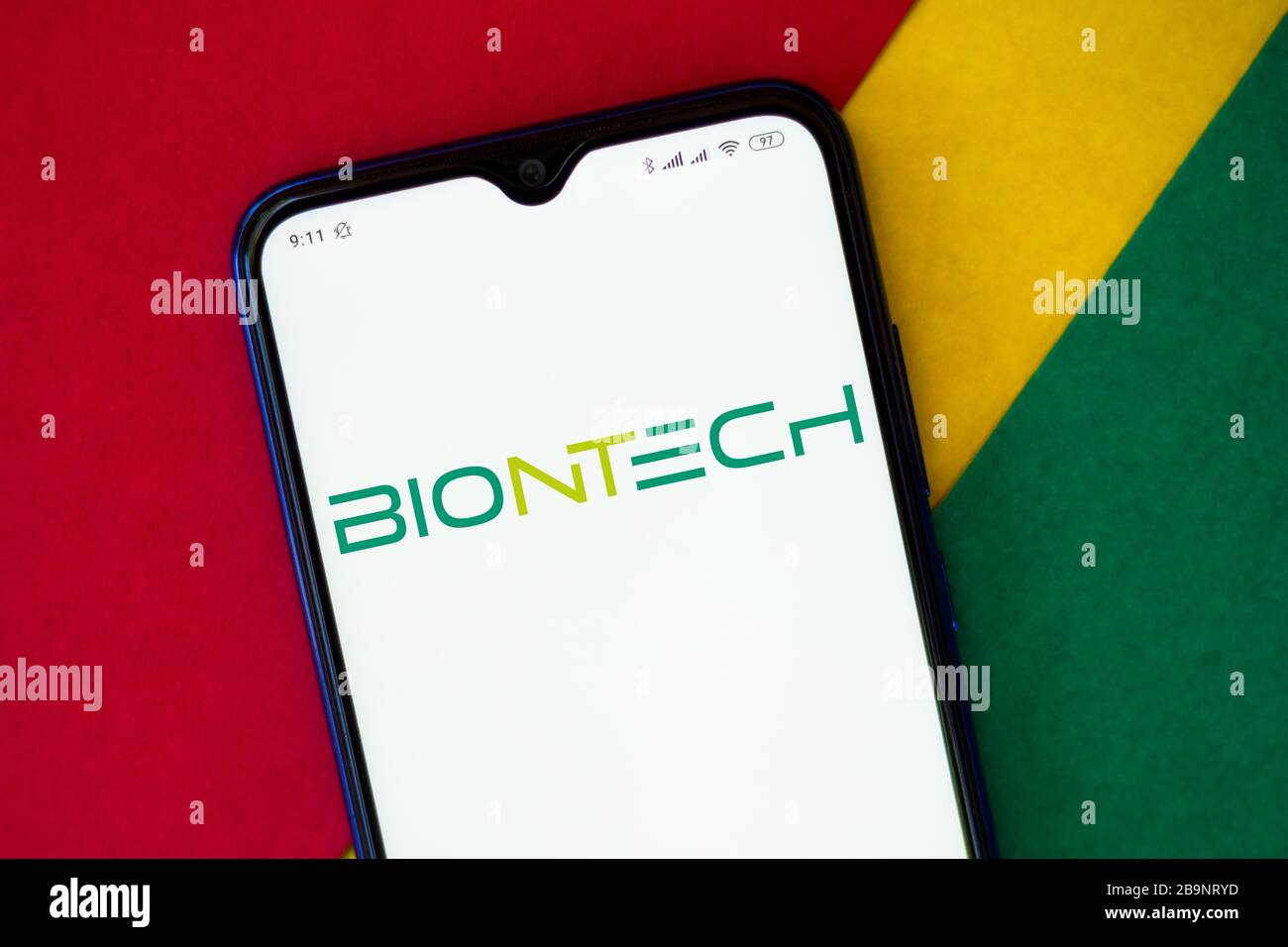 In this photo illustration a BioNTech SE logo seen displayed on a ...