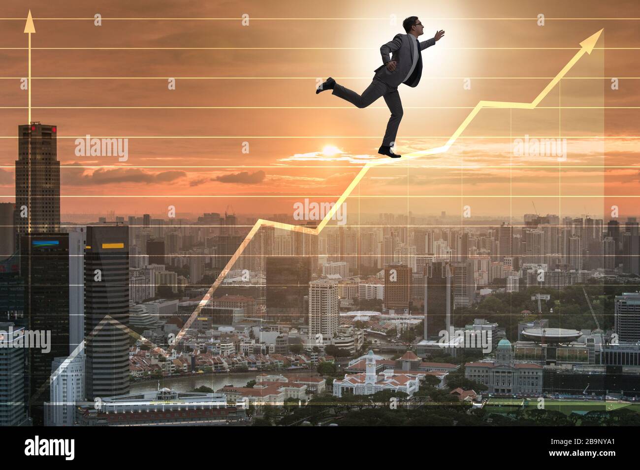 The businessman climbing bar charts in growth concept Stock Photo - Alamy