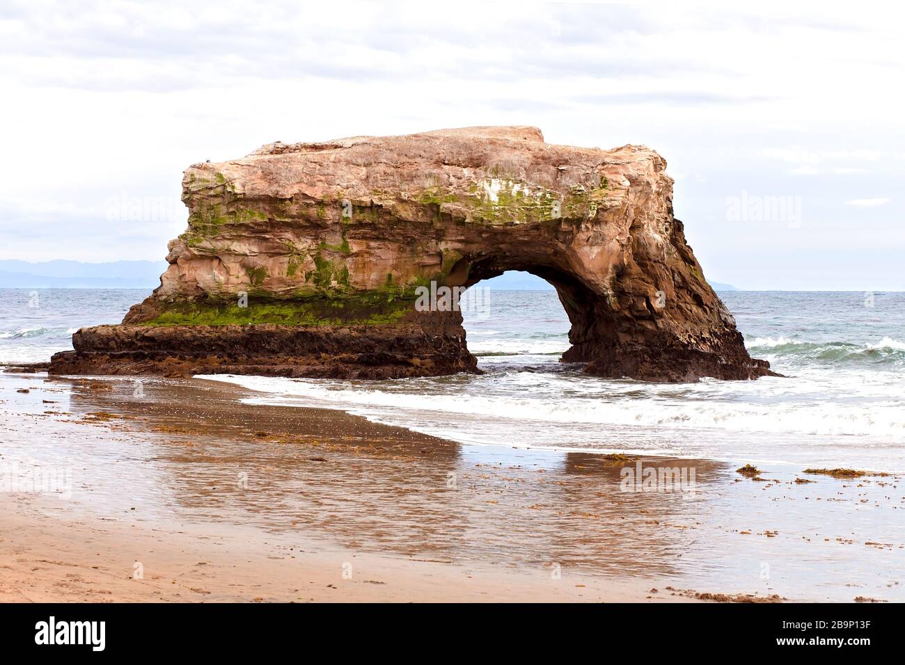 Large Rock Tunnel Formation With Tunnel on a Sandy Beach at National ...