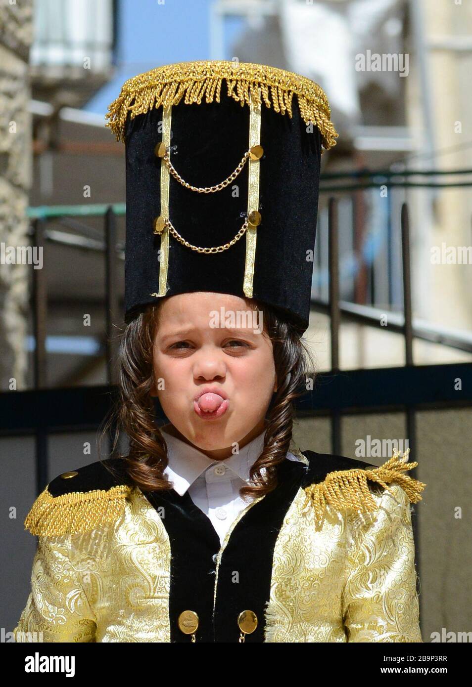 Hasidic boys wearing costumes for the Purim festival in the Mea Shearim ...