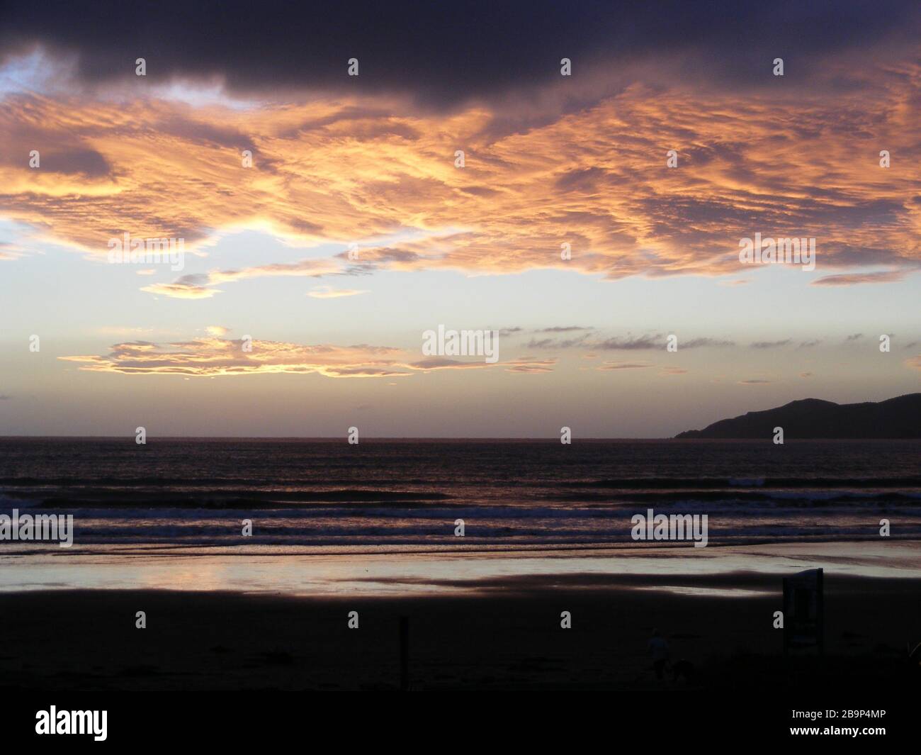 Beautiful scenery of New Zealand coastal sunset Stock Photo - Alamy