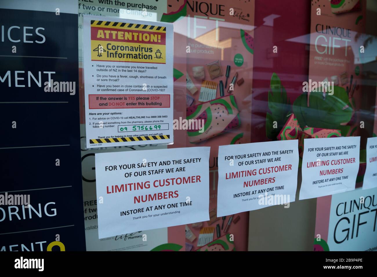 Sign limiting customers in store at any one time in pharmacy shop ...