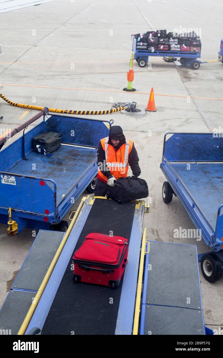 Airline employees working at Milwaukee Mitchell International Airport ...