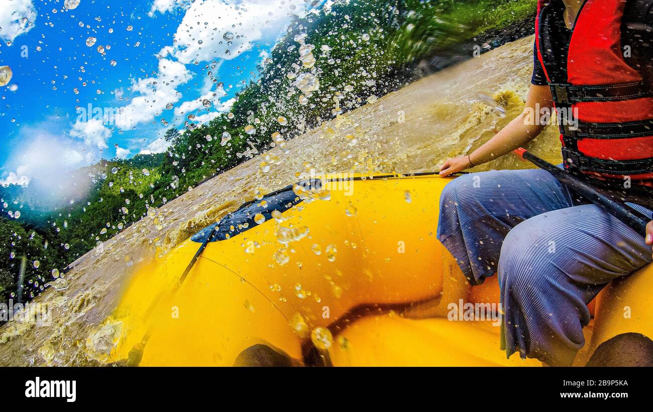 Water splashing during white water rafting in River Padas, Borneo Stock ...