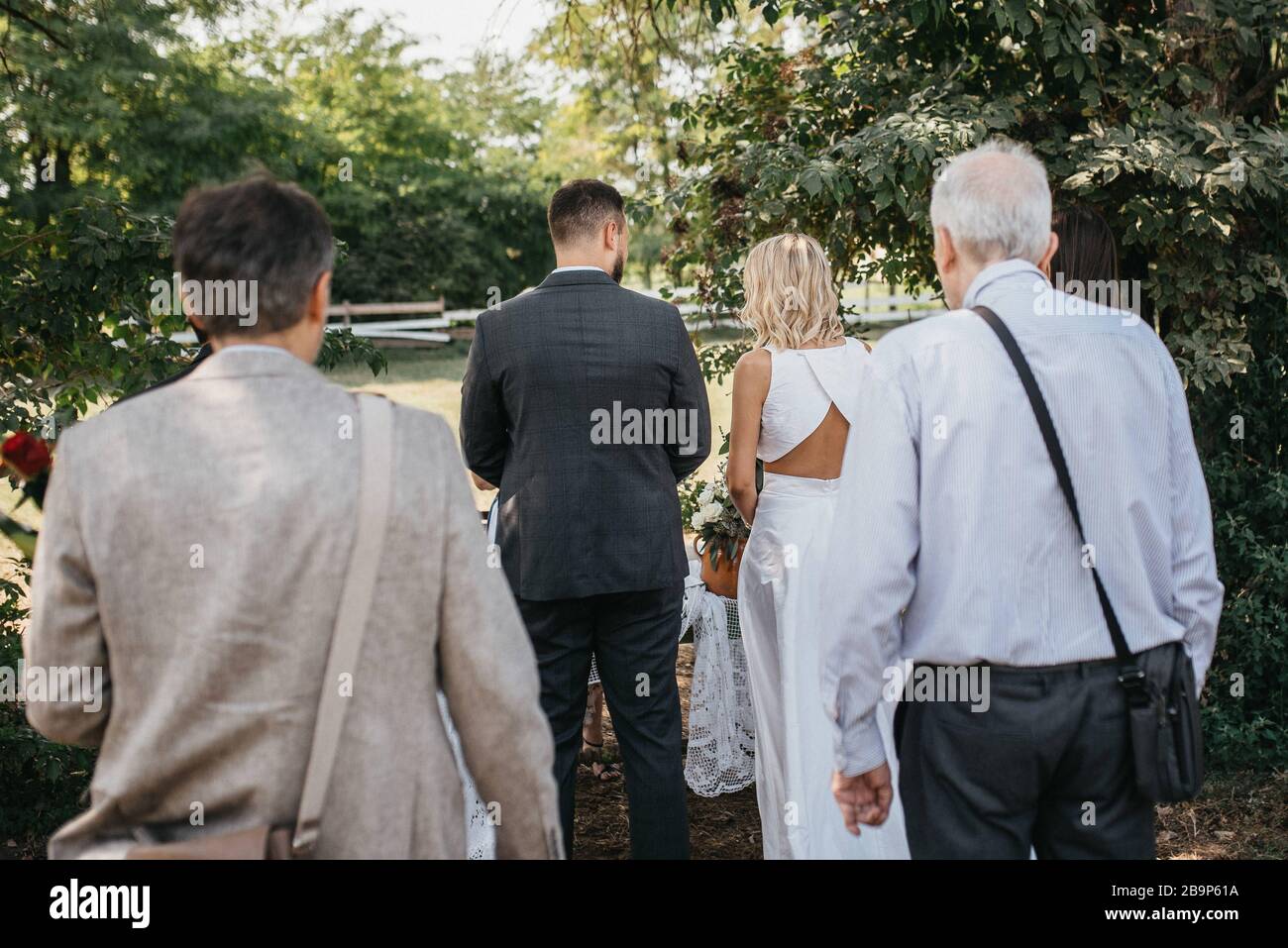 The bride and groom with their witness at the wedding Stock Photo - Alamy