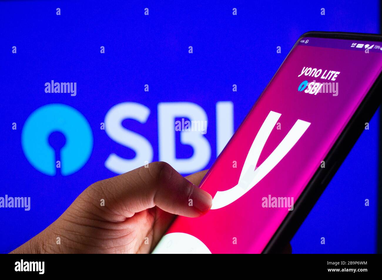 A mobile logged into the SBI bank mobile application infront of the SBI ...