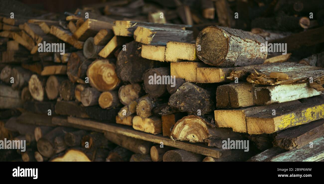Firewood closeup. Different types of wood harvested for winter Stock ...