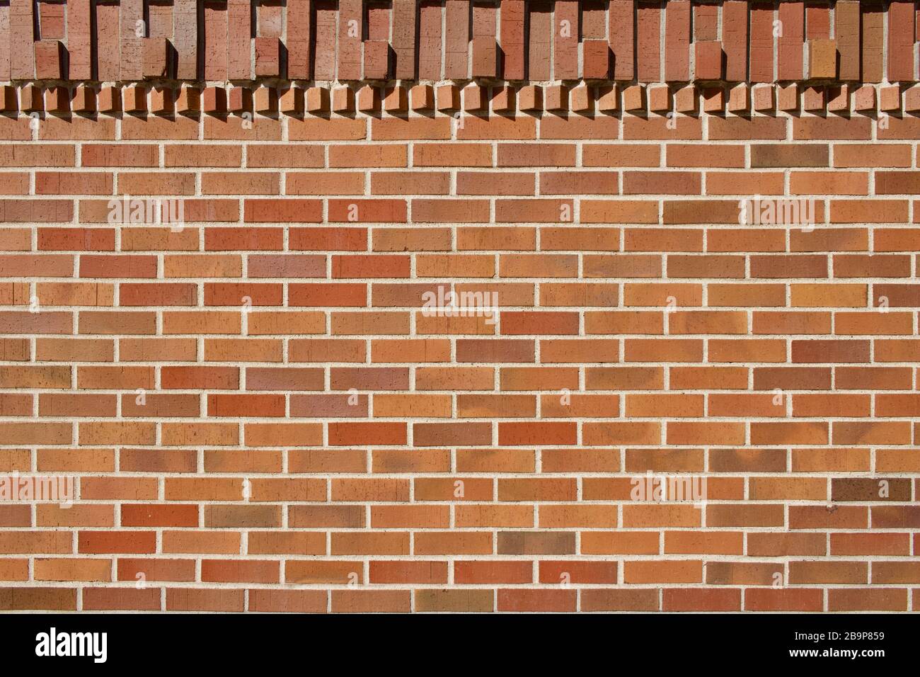 Protruding bricks in geometric shapes decorate the top of this ...