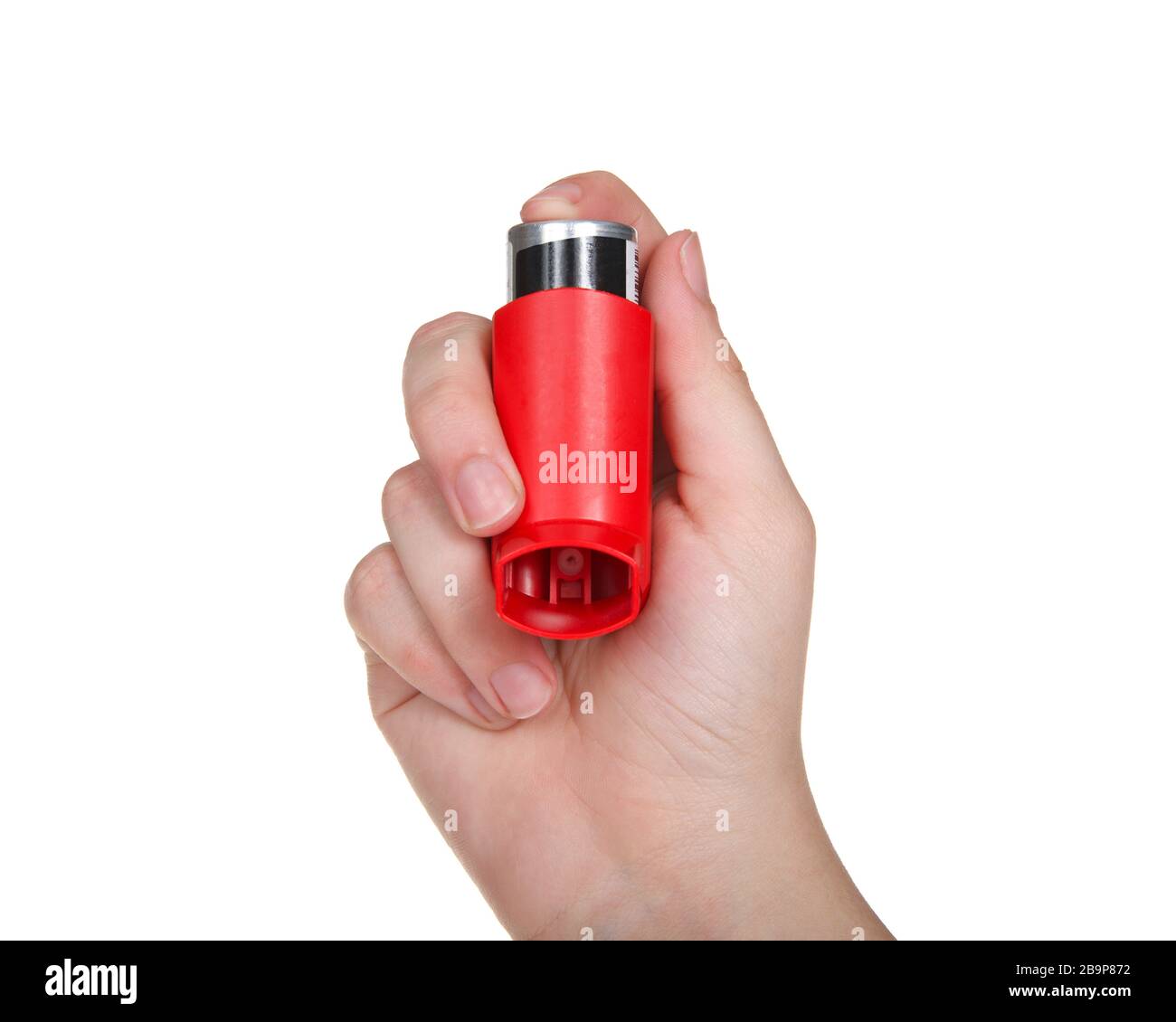 Young hand holding bronchodilator inhaler, isolated on white. Treatment ...