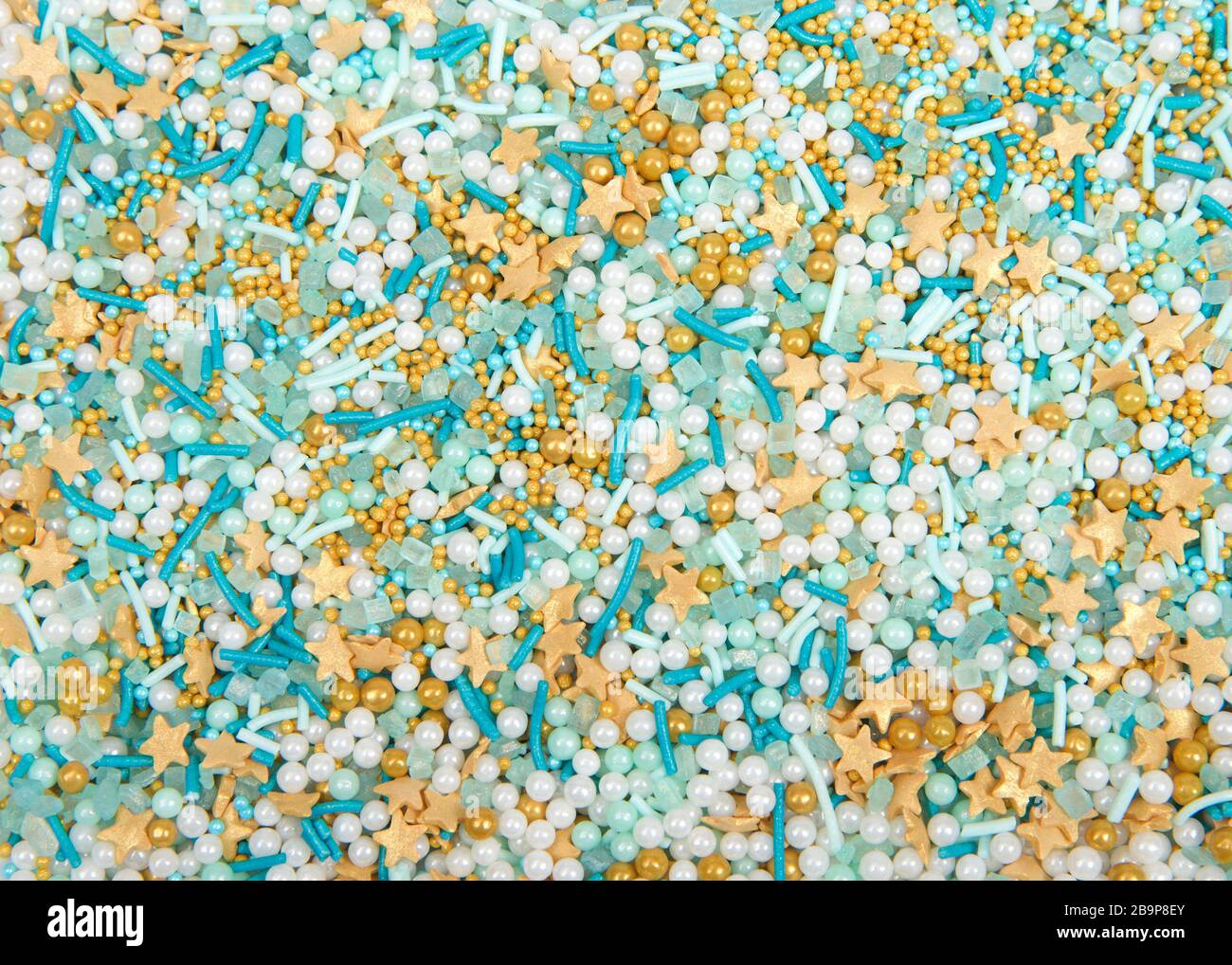 Aquatic theme background with turquoise candy sprinkles, white and ...