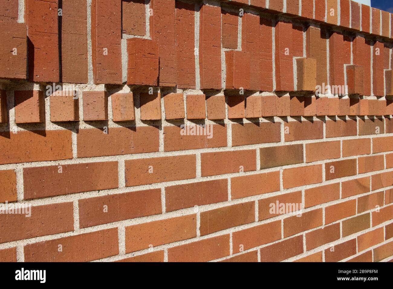 Protruding bricks in geometric shapes decorate the top of this ...