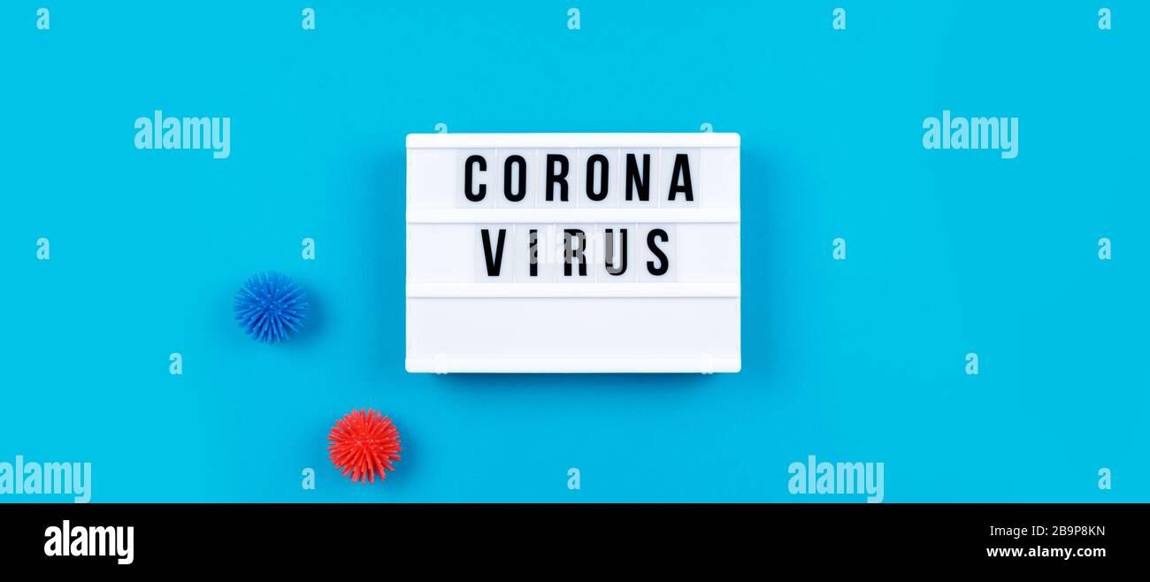 Lightbox with coronavirus wording and plastic balls aka viruses on the ...