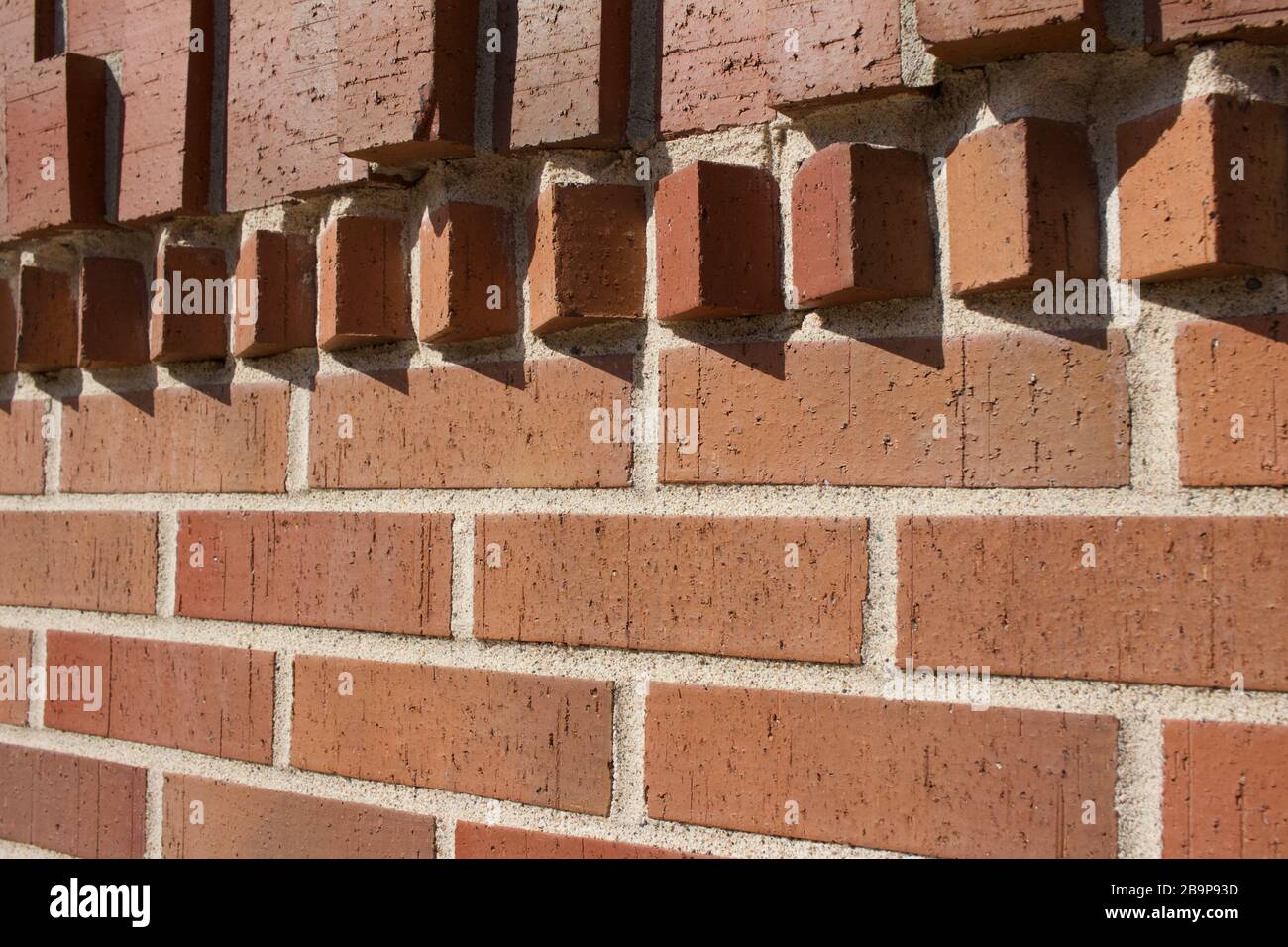 Protruding bricks in geometric shapes decorate the top of this ...