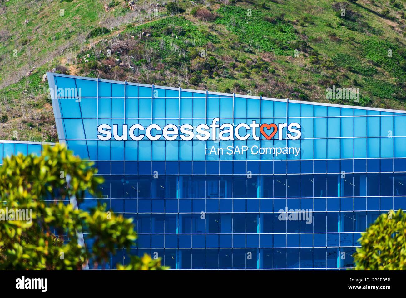 SAP SuccessFactors an SAP company sign on the glass facade of cloud ...