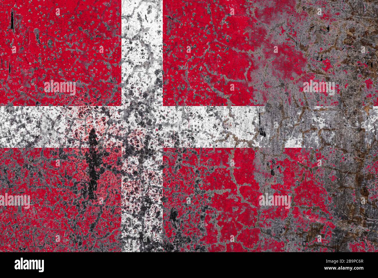 National flag of Denmark on old peeling wall background.The concept of ...