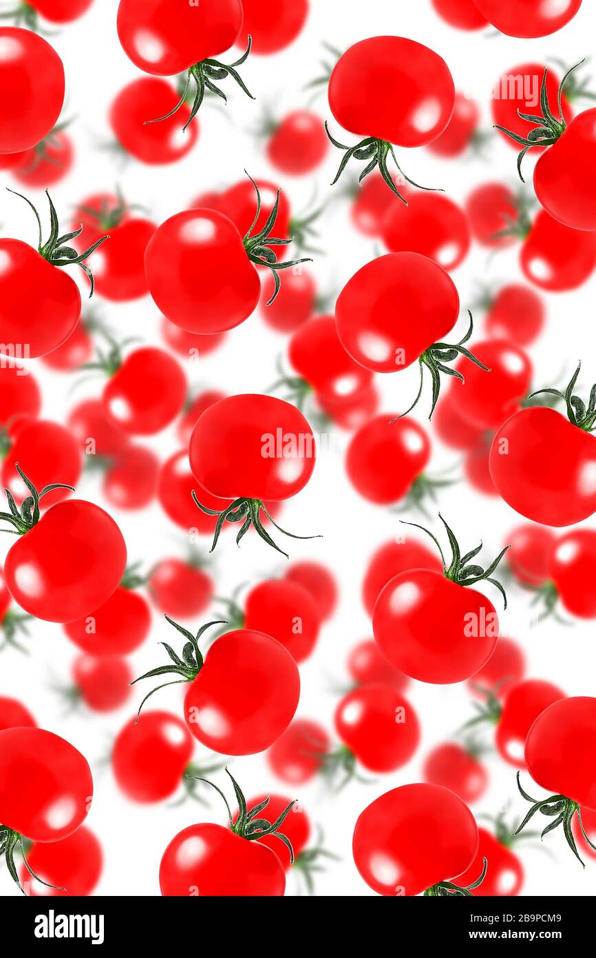 Red cherry tomatoes falling down isolated on white background. Open ...