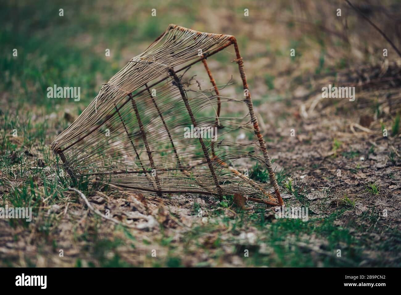 Summer, countryside, pond. snare for fish, manual work. Vintage style ...