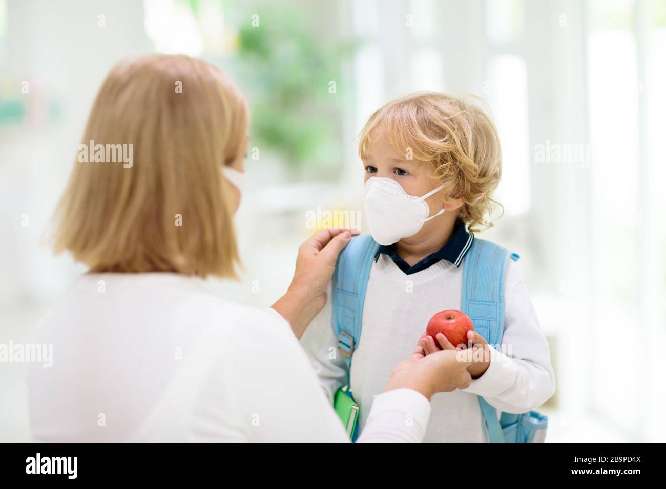 Boy mother wear protective hi-res stock photography and images - Alamy