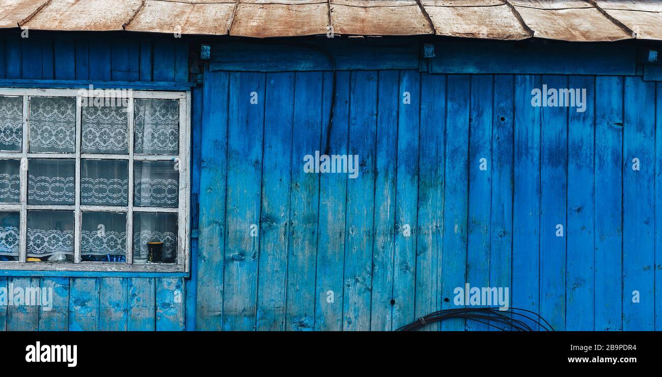 Old lady looking through window hi-res stock photography and images - Alamy