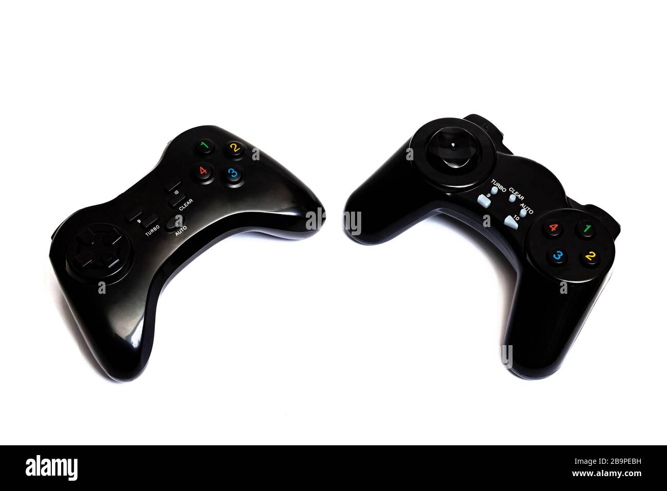 Two game joysticks isolated on white background Stock Photo - Alamy