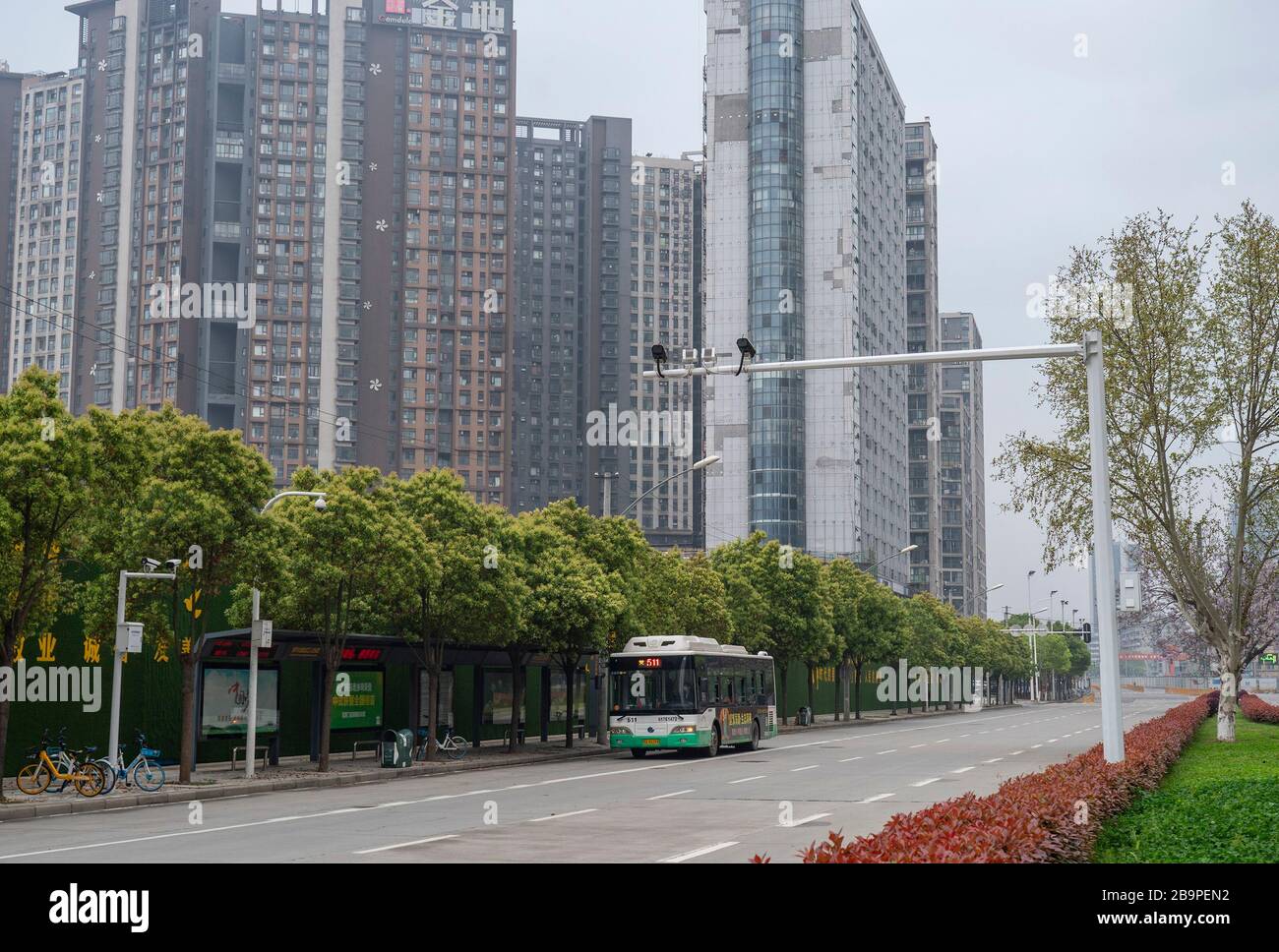 Wuhan, China's Hubei Province. 25th Mar, 2020. A bus runs on a road in ...