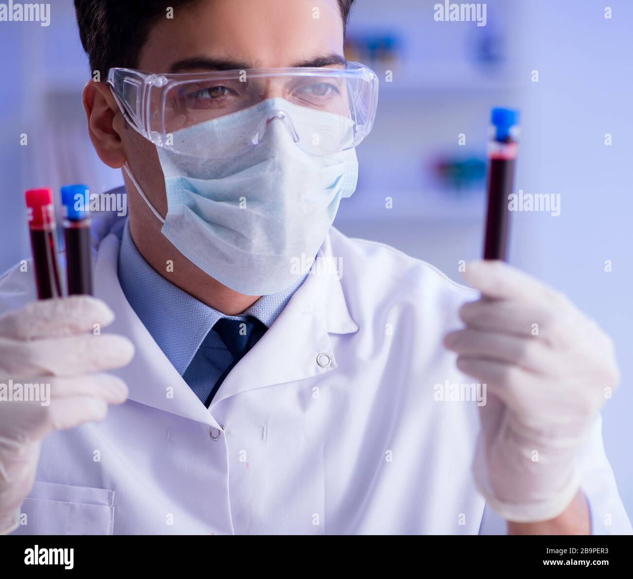 The lab assistant testing blood samples in hospital Stock Photo - Alamy