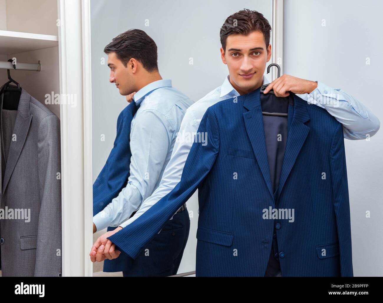 The businessman dressing up for work Stock Photo - Alamy