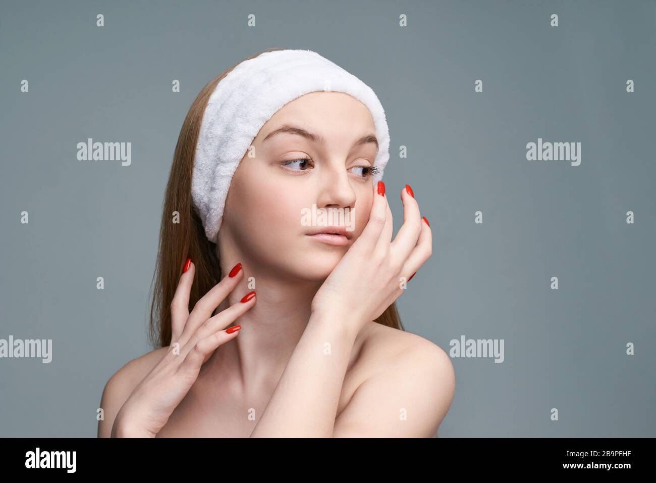 Young pretty woman studio portrait. Cosmetology concept Stock Photo - Alamy